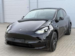 Black Tesla Model Y 2022 in Kaunas, with an engine capacity of 0.00 L and mileage of 62 thousand km for 17700 €, photo 8 on AUTOMOTO.COM.LV