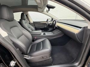 Black Tesla Model Y 2022 in Kaunas, with an engine capacity of 0.00 L and mileage of 62 thousand km for 17700 €, photo 14 on AUTOMOTO.COM.LV