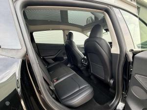 Black Tesla Model Y 2022 in Kaunas, with an engine capacity of 0.00 L and mileage of 62 thousand km for 17700 €, photo 15 on AUTOMOTO.COM.LV