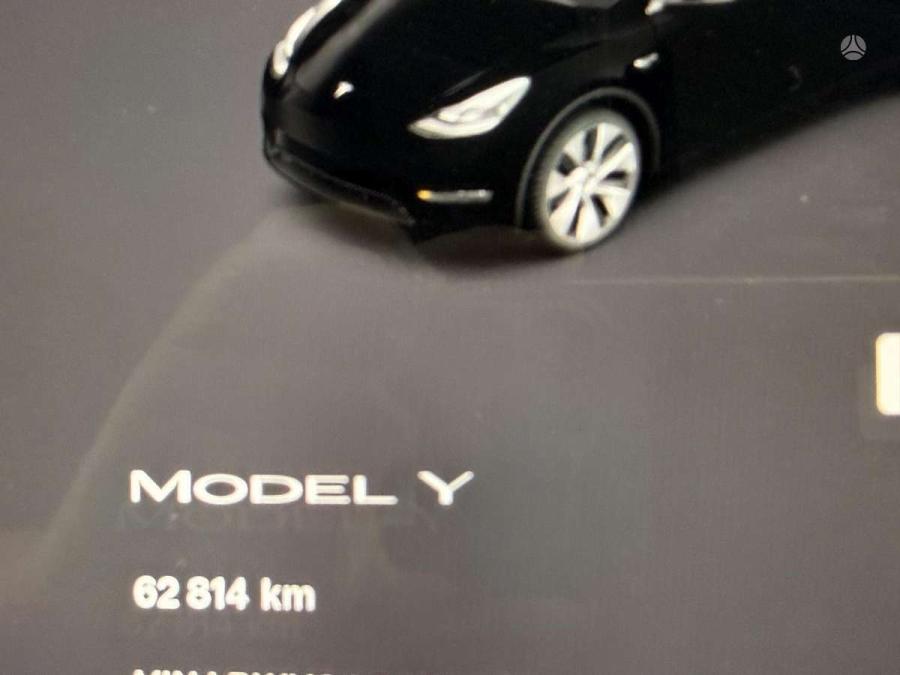 Black Tesla Model Y 2022 in Kaunas, with an engine capacity of 0.00 L and mileage of 62 thousand km for 17700 €, photo 22 on AUTOMOTO.COM.LV