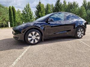 Melns Tesla Model Y 2023 Alīta, ar dzinēja tilpumu 0.00 L un nobraukumu 50 tūkst. km par 25400 €, foto  vietnē AUTOMOTO.COM.LV