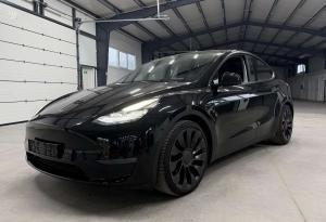 Black Tesla Model Y 2022 in Kaunas, with an engine capacity of 0.00 L and mileage of 50 thousand km for 23500 €, photo  on AUTOMOTO.COM.LV