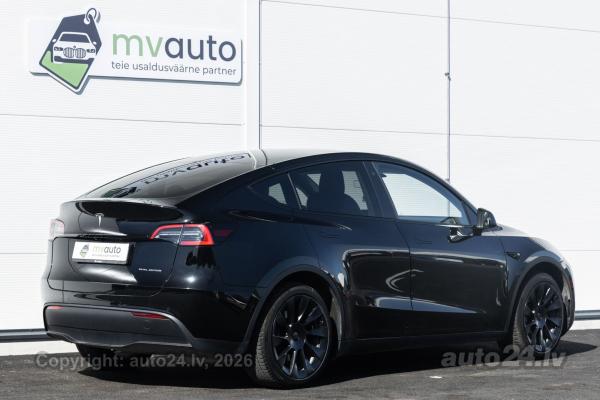 Black Tesla Model Y 2022 in Tallinn, with an engine capacity of 0.00 L and mileage of 73 thousand km for 31990 €, photo 2 on AUTOMOTO.COM.LV