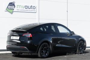 Black Tesla Model Y 2022 in Tallinn, with an engine capacity of 0.00 L and mileage of 73 thousand km for 31990 €, photo 3 on AUTOMOTO.COM.LV