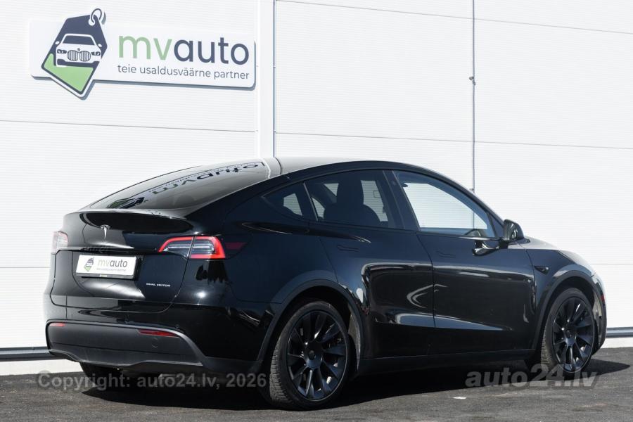 Black Tesla Model Y 2022 in Tallinn, with an engine capacity of 0.00 L and mileage of 73 thousand km for 31990 €, photo 3 on AUTOMOTO.COM.LV
