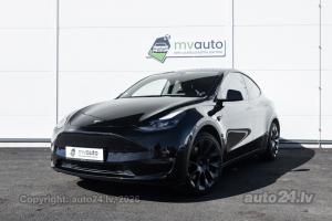 Black Tesla Model Y 2022 in Tallinn, with an engine capacity of 0.00 L and mileage of 73 thousand km for 31990 €, photo 4 on AUTOMOTO.COM.LV