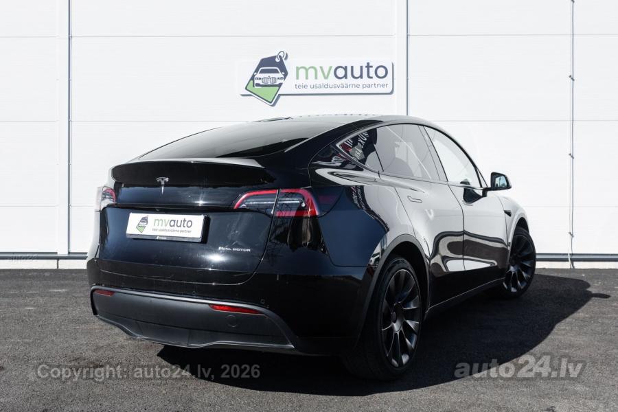 Black Tesla Model Y 2022 in Tallinn, with an engine capacity of 0.00 L and mileage of 73 thousand km for 31990 €, photo 7 on AUTOMOTO.COM.LV