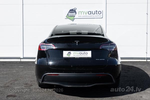 Black Tesla Model Y 2022 in Tallinn, with an engine capacity of 0.00 L and mileage of 73 thousand km for 31990 €, photo 7 on AUTOMOTO.COM.LV