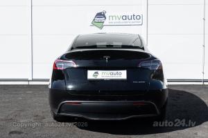 Black Tesla Model Y 2022 in Tallinn, with an engine capacity of 0.00 L and mileage of 73 thousand km for 31990 €, photo 8 on AUTOMOTO.COM.LV