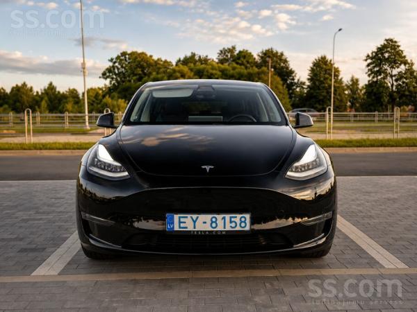 Black Tesla Model Y 2023 in Jelgava, with an engine capacity of 0.00 L and mileage of 0 thousand km for 28000 €, photo 3 on AUTOMOTO.COM.LV