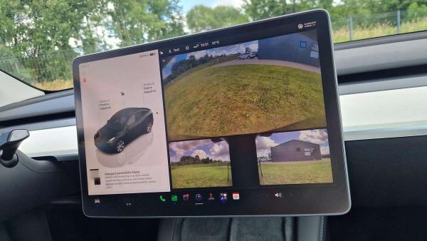 Black Tesla Model Y 2023 in Kaisiadorys, with an engine capacity of 0.00 L and mileage of 54 thousand km for 27900 €, photo 5 on AUTOMOTO.COM.LV