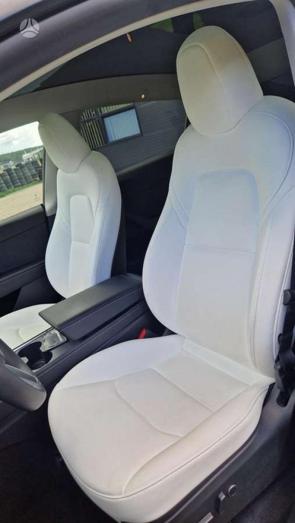 Black Tesla Model Y 2023 in Kaisiadorys, with an engine capacity of 0.00 L and mileage of 54 thousand km for 27900 €, photo 6 on AUTOMOTO.COM.LV