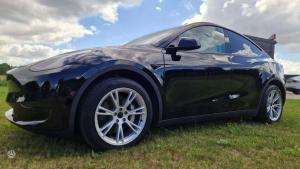 Black Tesla Model Y 2023 in Kaisiadorys, with an engine capacity of 0.00 L and mileage of 54 thousand km for 27900 €, photo 11 on AUTOMOTO.COM.LV