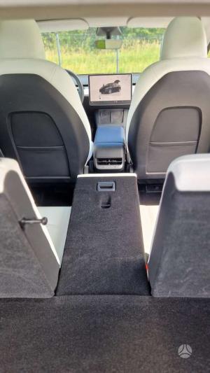 Black Tesla Model Y 2023 in Kaisiadorys, with an engine capacity of 0.00 L and mileage of 54 thousand km for 27900 €, photo 17 on AUTOMOTO.COM.LV