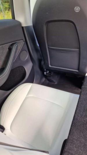Black Tesla Model Y 2023 in Kaisiadorys, with an engine capacity of 0.00 L and mileage of 54 thousand km for 27900 €, photo 19 on AUTOMOTO.COM.LV