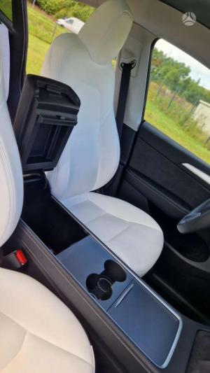 Black Tesla Model Y 2023 in Kaisiadorys, with an engine capacity of 0.00 L and mileage of 54 thousand km for 27900 €, photo 23 on AUTOMOTO.COM.LV