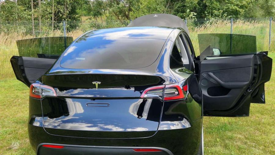 Black Tesla Model Y 2023 in Kaisiadorys, with an engine capacity of 0.00 L and mileage of 54 thousand km for 27900 €, photo 31 on AUTOMOTO.COM.LV