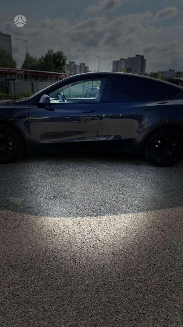 Black Tesla Model Y 2024 in Kaunas, with an engine capacity of 0.00 L and mileage of 58 thousand km for 26599 €, photo 5 on AUTOMOTO.COM.LV