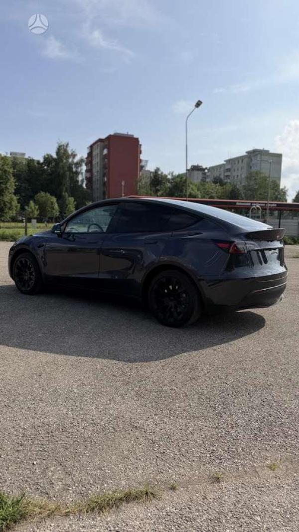 Black Tesla Model Y 2024 in Kaunas, with an engine capacity of 0.00 L and mileage of 58 thousand km for 26599 €, photo 6 on AUTOMOTO.COM.LV