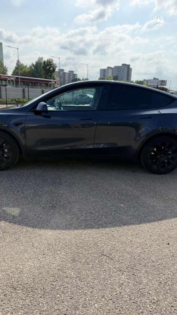 Black Tesla Model Y 2024 in Kaunas, with an engine capacity of 0.00 L and mileage of 58 thousand km for 26599 €, photo 10 on AUTOMOTO.COM.LV