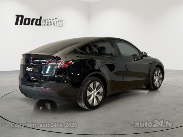 Black Tesla Model Y 2022 in Tallinn, with an engine capacity of 0.00 L and mileage of 76 thousand km for 37900 €, photo 2 on AUTOMOTO.COM.LV