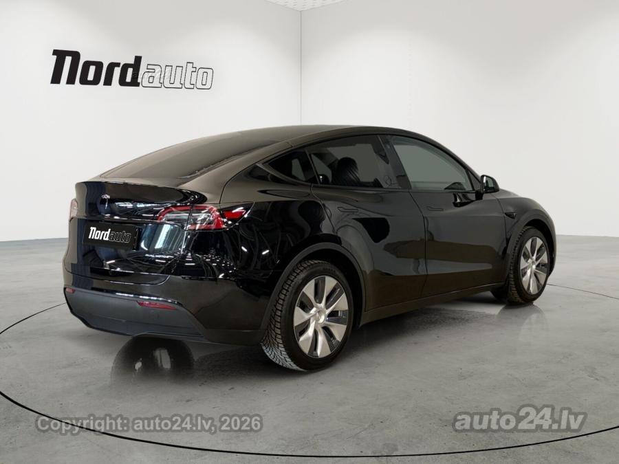Black Tesla Model Y 2022 in Tallinn, with an engine capacity of 0.00 L and mileage of 76 thousand km for 37900 €, photo 3 on AUTOMOTO.COM.LV