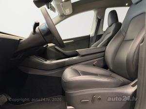 Black Tesla Model Y 2022 in Tallinn, with an engine capacity of 0.00 L and mileage of 76 thousand km for 37900 €, photo 6 on AUTOMOTO.COM.LV