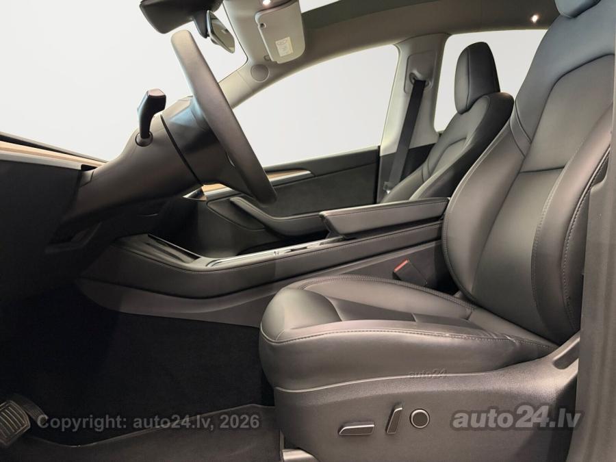 Black Tesla Model Y 2022 in Tallinn, with an engine capacity of 0.00 L and mileage of 76 thousand km for 37900 €, photo 6 on AUTOMOTO.COM.LV
