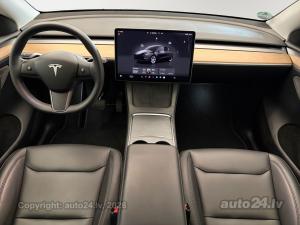 Black Tesla Model Y 2022 in Tallinn, with an engine capacity of 0.00 L and mileage of 76 thousand km for 37900 €, photo 8 on AUTOMOTO.COM.LV