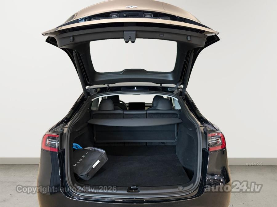 Black Tesla Model Y 2022 in Tallinn, with an engine capacity of 0.00 L and mileage of 76 thousand km for 37900 €, photo 12 on AUTOMOTO.COM.LV