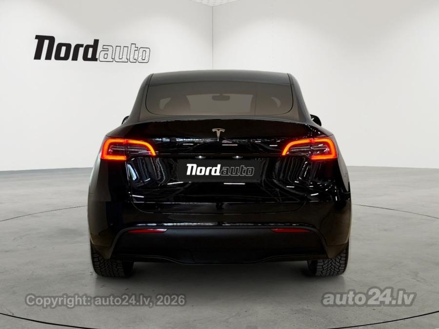 Black Tesla Model Y 2022 in Tallinn, with an engine capacity of 0.00 L and mileage of 36 thousand km for 38900 €, photo 5 on AUTOMOTO.COM.LV