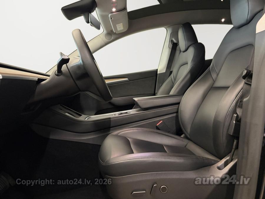 Black Tesla Model Y 2022 in Tallinn, with an engine capacity of 0.00 L and mileage of 36 thousand km for 38900 €, photo 6 on AUTOMOTO.COM.LV