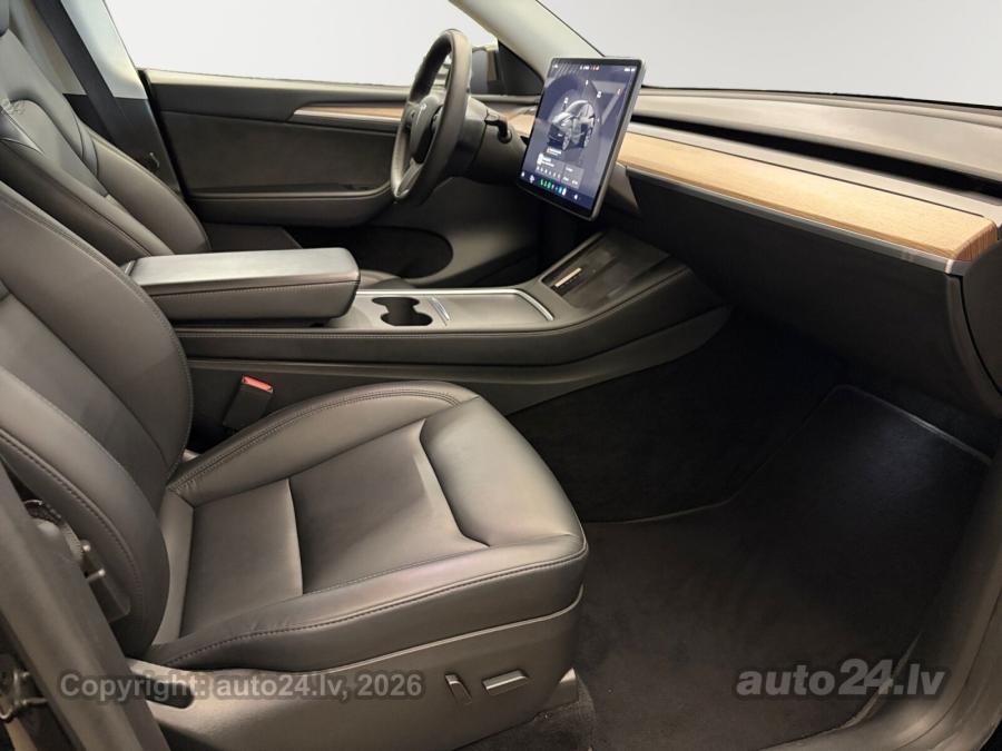 Black Tesla Model Y 2022 in Tallinn, with an engine capacity of 0.00 L and mileage of 36 thousand km for 38900 €, photo 8 on AUTOMOTO.COM.LV