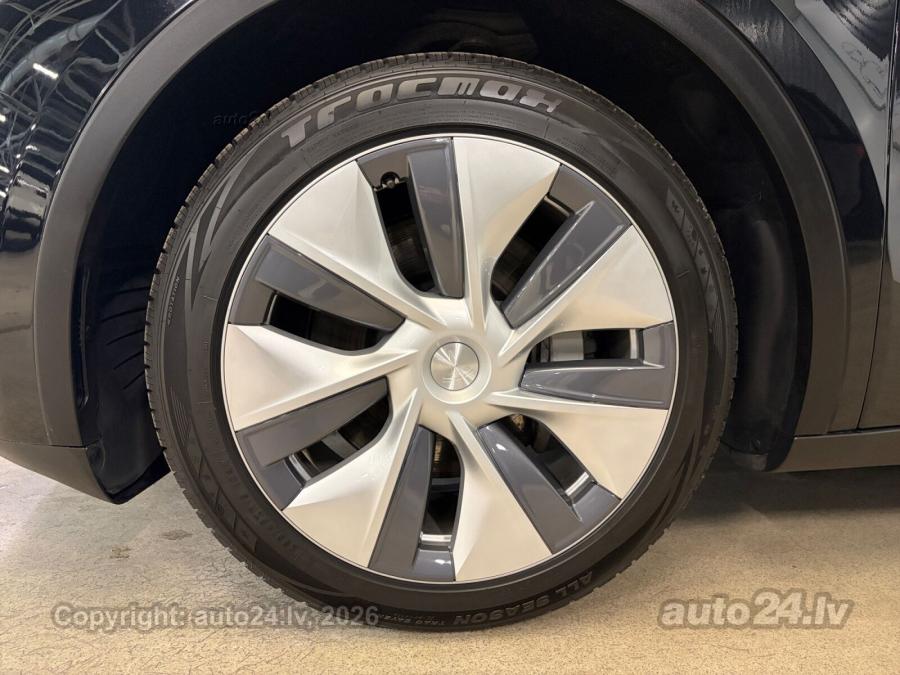 Black Tesla Model Y 2022 in Tallinn, with an engine capacity of 0.00 L and mileage of 36 thousand km for 38900 €, photo 13 on AUTOMOTO.COM.LV