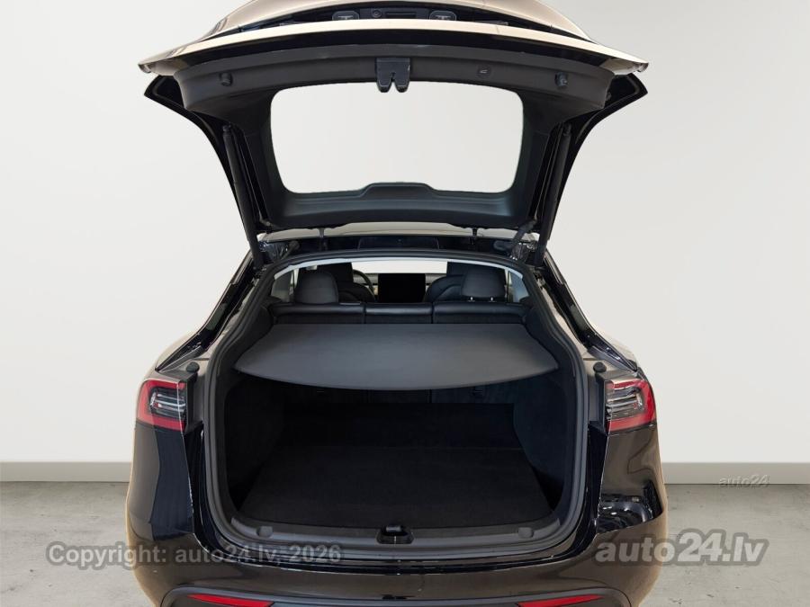 Black Tesla Model Y 2022 in Tallinn, with an engine capacity of 0.00 L and mileage of 36 thousand km for 38900 €, photo 14 on AUTOMOTO.COM.LV