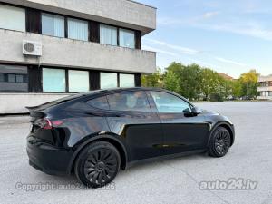 Black Tesla Model Y 2023 in Tallinn, with an engine capacity of 0.00 L and mileage of 90 thousand km for 34800 €, photo 6 on AUTOMOTO.COM.LV