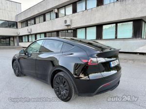 Black Tesla Model Y 2023 in Tallinn, with an engine capacity of 0.00 L and mileage of 90 thousand km for 34800 €, photo 7 on AUTOMOTO.COM.LV