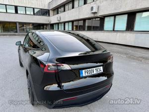 Black Tesla Model Y 2023 in Tallinn, with an engine capacity of 0.00 L and mileage of 90 thousand km for 34800 €, photo 8 on AUTOMOTO.COM.LV