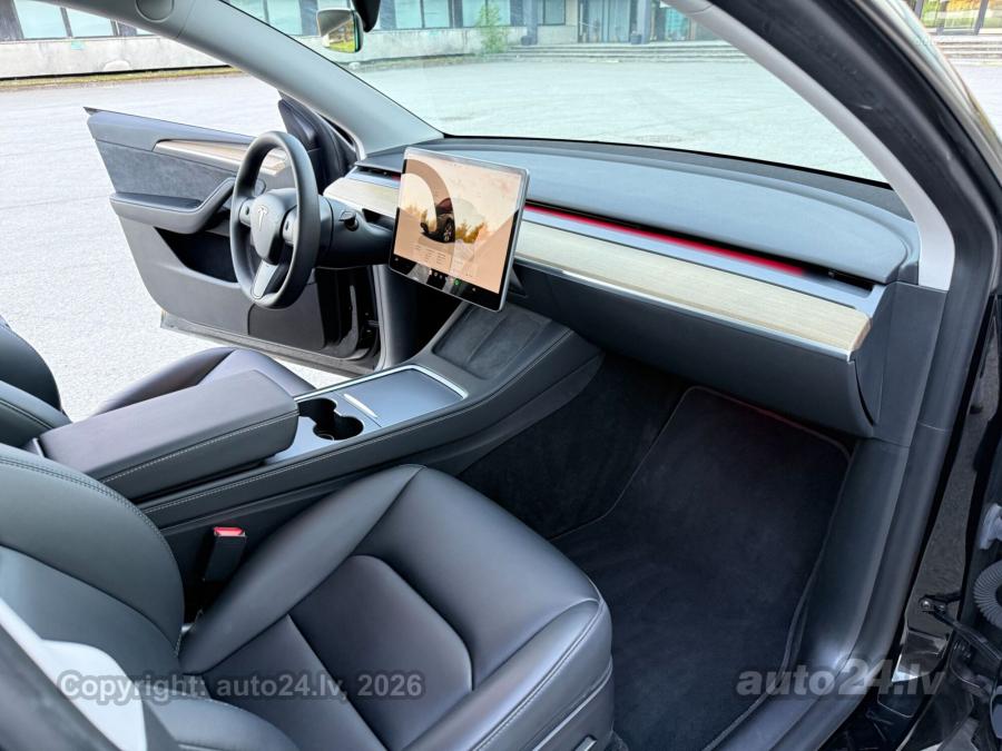 Black Tesla Model Y 2023 in Tallinn, with an engine capacity of 0.00 L and mileage of 90 thousand km for 34800 €, photo 10 on AUTOMOTO.COM.LV