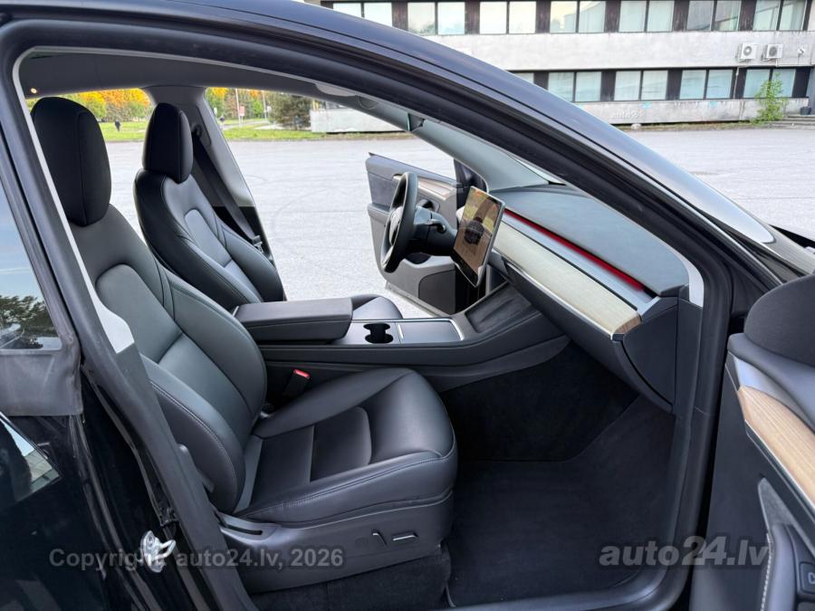 Black Tesla Model Y 2023 in Tallinn, with an engine capacity of 0.00 L and mileage of 90 thousand km for 34800 €, photo 11 on AUTOMOTO.COM.LV