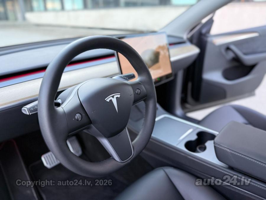 Black Tesla Model Y 2023 in Tallinn, with an engine capacity of 0.00 L and mileage of 90 thousand km for 34800 €, photo 13 on AUTOMOTO.COM.LV