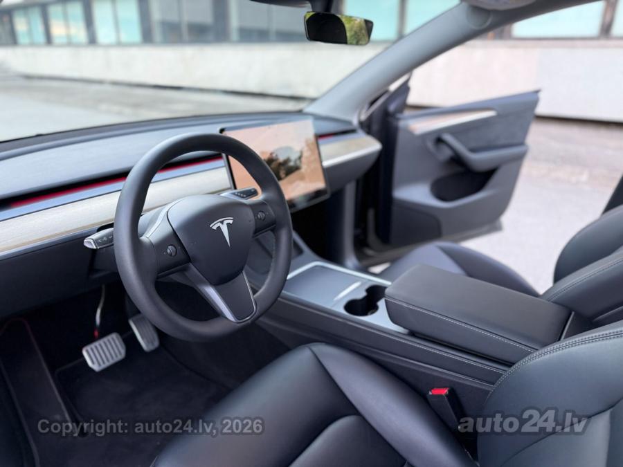 Black Tesla Model Y 2023 in Tallinn, with an engine capacity of 0.00 L and mileage of 90 thousand km for 34800 €, photo 14 on AUTOMOTO.COM.LV