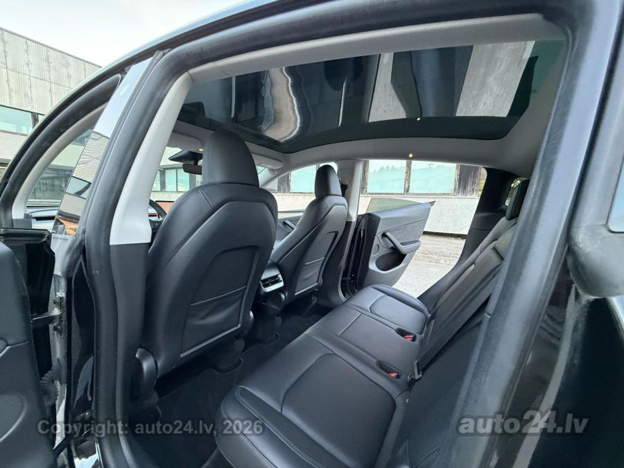 Black Tesla Model Y 2023 in Tallinn, with an engine capacity of 0.00 L and mileage of 90 thousand km for 34800 €, photo 15 on AUTOMOTO.COM.LV