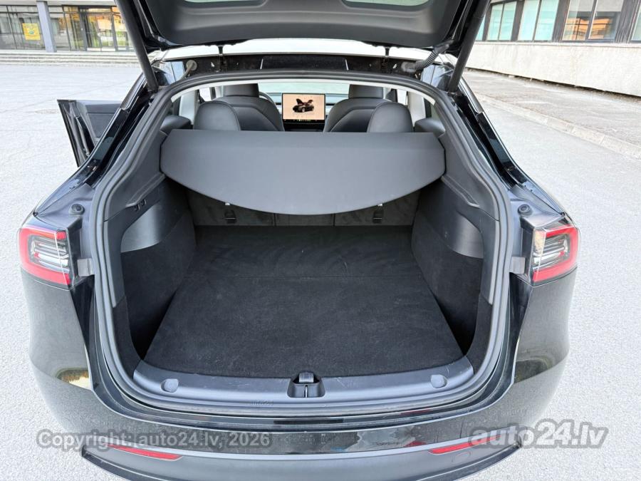 Black Tesla Model Y 2023 in Tallinn, with an engine capacity of 0.00 L and mileage of 90 thousand km for 34800 €, photo 22 on AUTOMOTO.COM.LV