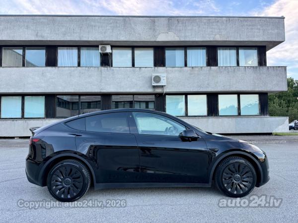 Black Tesla Model Y 2023 in Tallinn, with an engine capacity of 0.00 L and mileage of 114 thousand km for 32900 €, photo 6 on AUTOMOTO.COM.LV