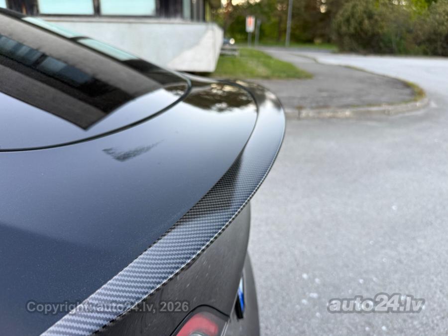 Melns Tesla Model Y 2023 Tallina, ar dzinēja tilpumu 0.00 L un nobraukumu 114 tūkst. km par 32900 €, foto 26 vietnē AUTOMOTO.COM.LV