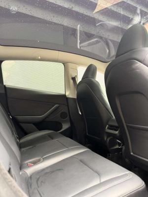 Melns Tesla Model Y 2023 Viļņa, ar dzinēja tilpumu 0.00 L un nobraukumu 66 tūkst. km par 32900 €, foto 7 vietnē AUTOMOTO.COM.LV