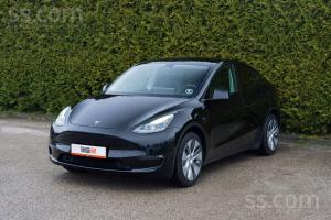 Black Tesla Model Y 2024 in Riga, with an engine capacity of 0.00 L and mileage of 24 thousand km for 43900 €, photo  on AUTOMOTO.COM.LV