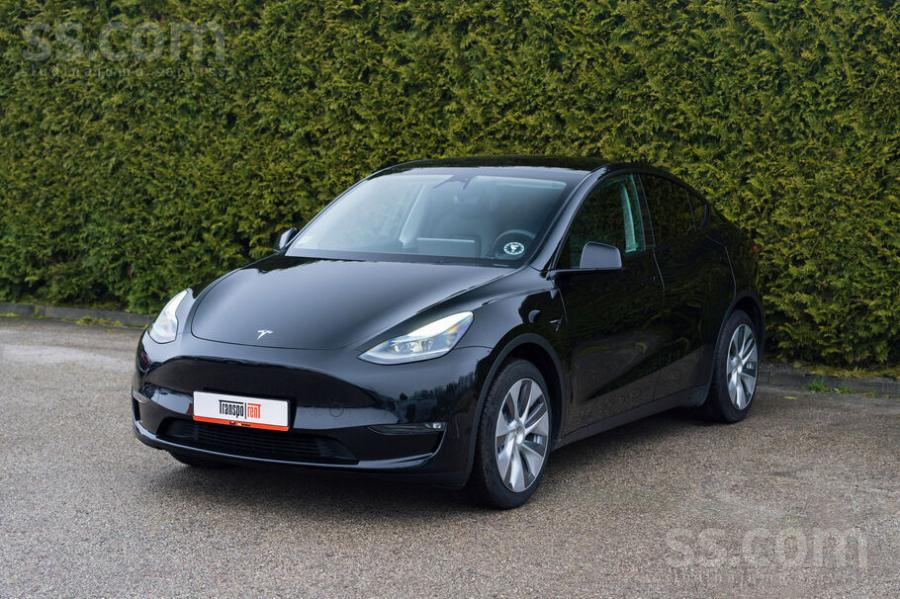 Black Tesla Model Y 2024 in Riga, with an engine capacity of 0.00 L and mileage of 24 thousand km for 43900 €, photo 1 on AUTOMOTO.COM.LV