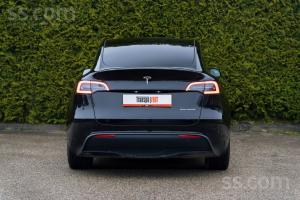 Black Tesla Model Y 2024 in Riga, with an engine capacity of 0.00 L and mileage of 24 thousand km for 43900 €, photo 6 on AUTOMOTO.COM.LV